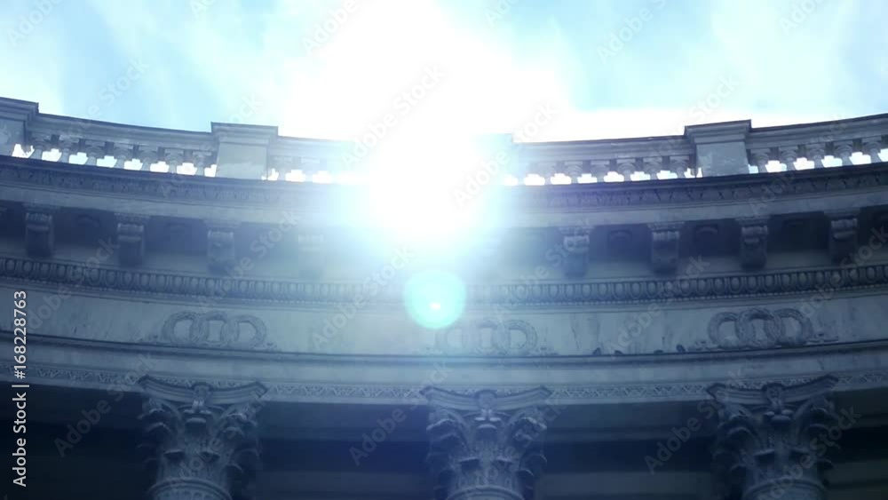 The rays of the sun are reflected in the columns of the cathedral with ...