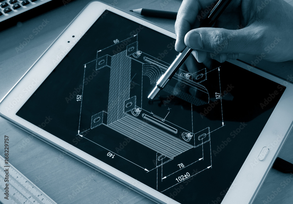 engineer working on computer on electrical piece design Stock Photo ...
