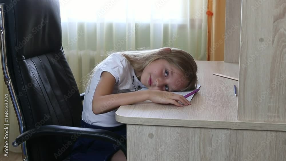 Girl lying on table. Young girl tired study. Caucasian girl lying down ...