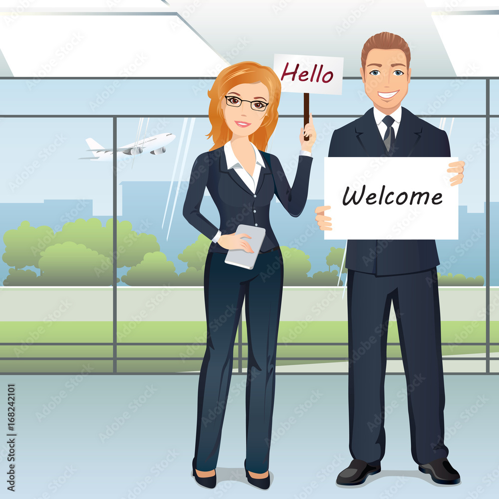 Group of people meet someone in airport hall / A woman and a man greet ...