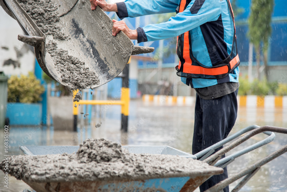 Construction worker Concrete pouring during commercial concreting ...
