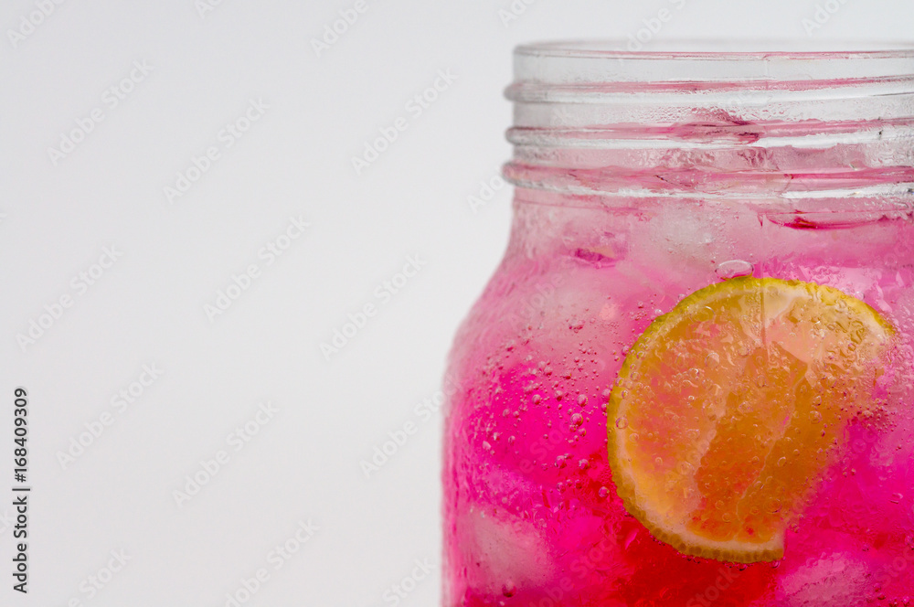 Light red or pink Italian soda in glass bottle isolated on white ...