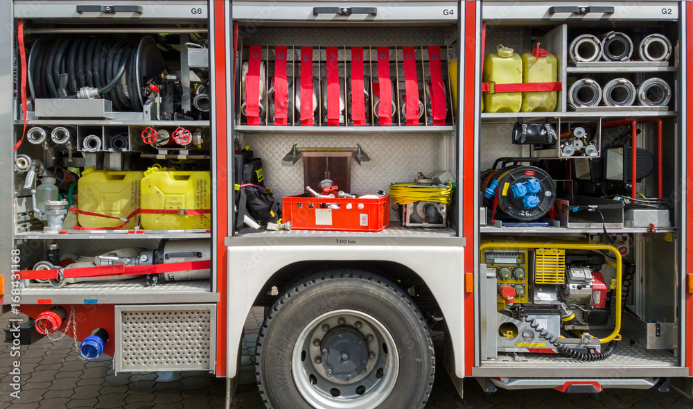 German fire engine truck with open doors Stock Photo | Adobe Stock