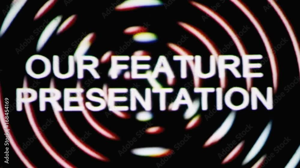 Vhs real projection: the text Our feature presentation appears over a ...