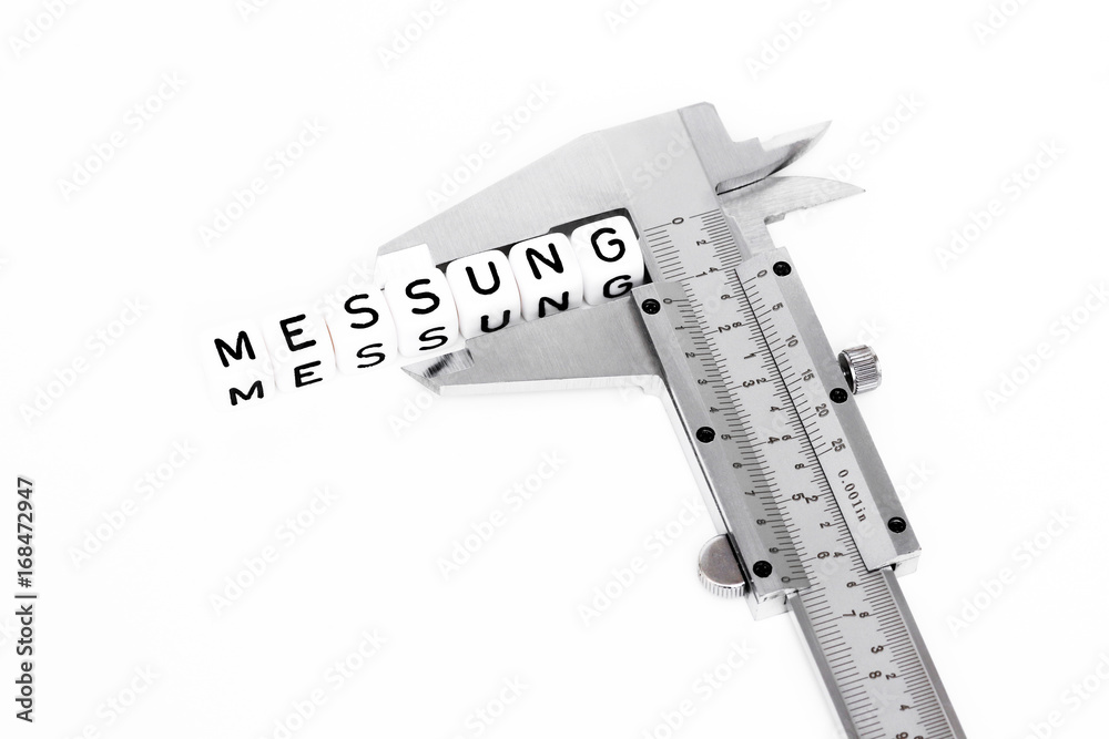 Messung mit einem Messschieber Stock-Foto | Adobe Stock