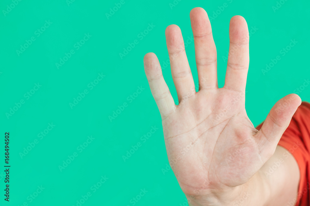 Stop sign symbol made with open hand by man isolated on green screen ...