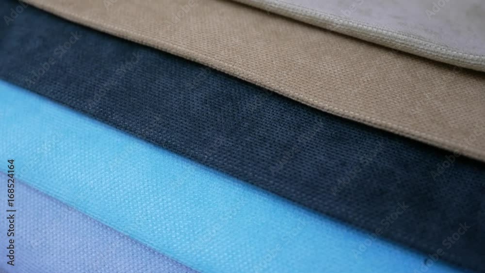 Fabric Samples Of Different Colors In Move Are Spinning And Rotation ...