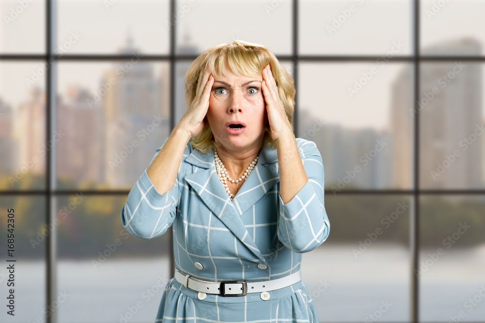 Portrait of astonished mature woman. Closeup portrait of a terrified ...