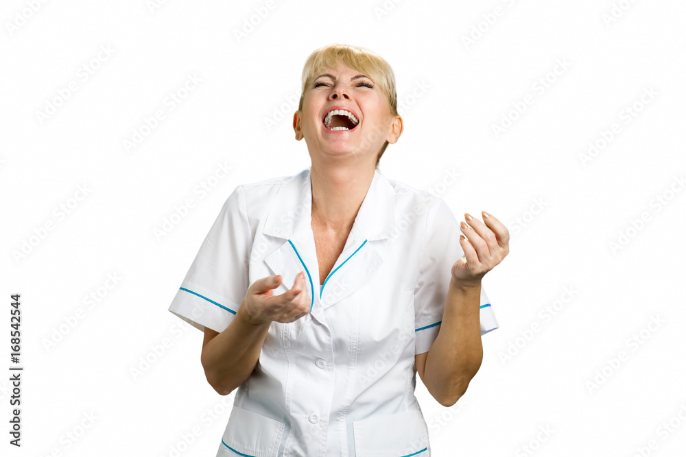 Foto Stock Laughing nurse on white background. Portrait of excited ...
