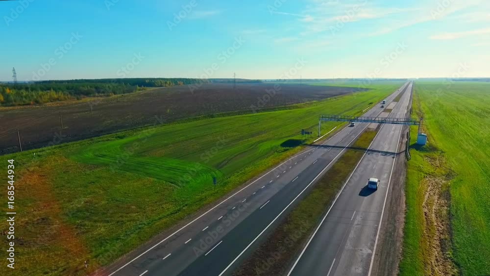Cars driving at highway road. View from above. Aerial view of cars ride ...