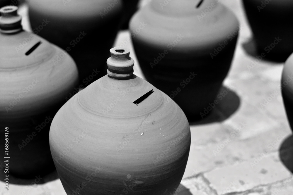 hand made clay money bank dried on sun at pottery square in Bhaktapur ...