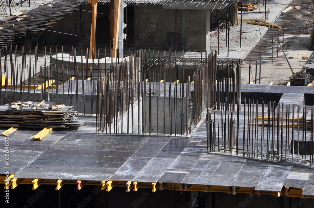 Construction site with iron rods placed in grid patterns for making ...