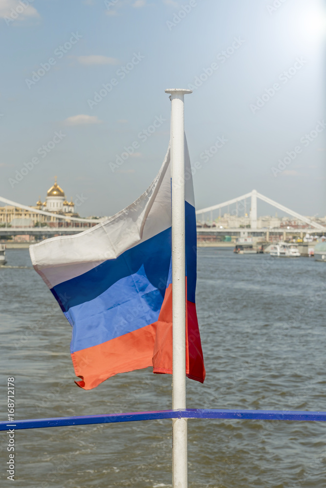The National flag of Russia flay over the boat on Moscow city ...