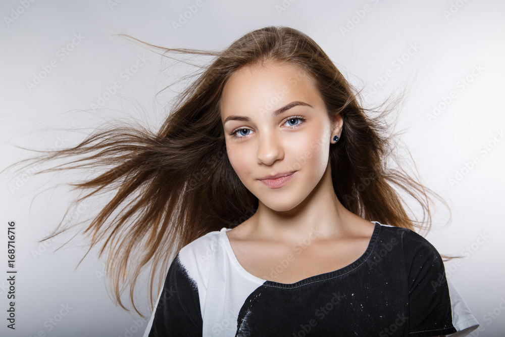 Beautiful model with windy hair Stock Photo | Adobe Stock