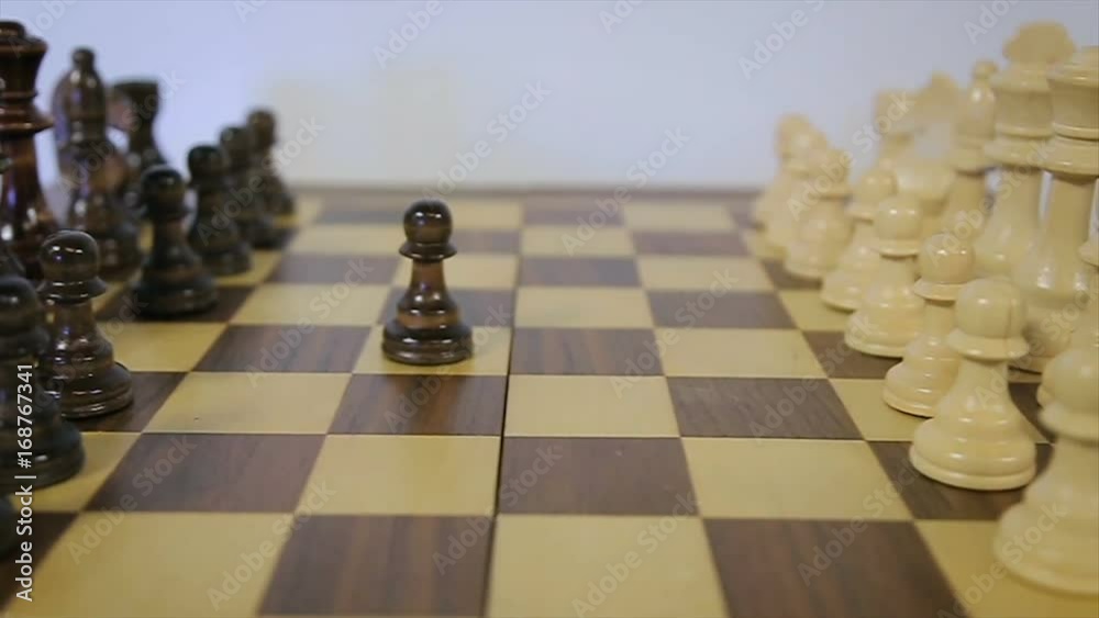 Video Stock Chess board. Dolly panorama from black chess pieces to ...