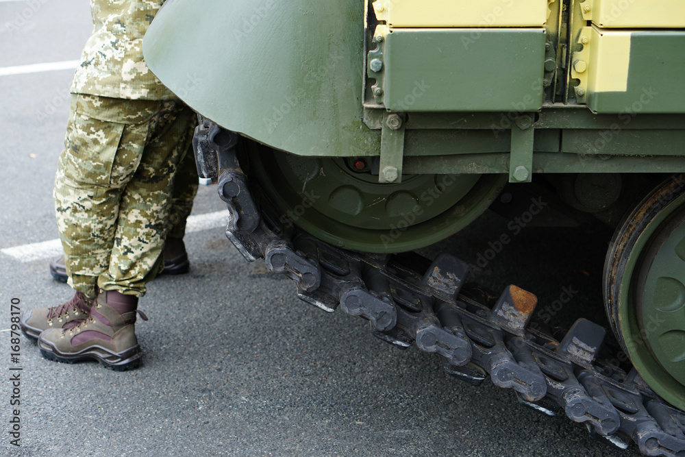 Elements of the running gear of a military vehicle. Background. Close ...