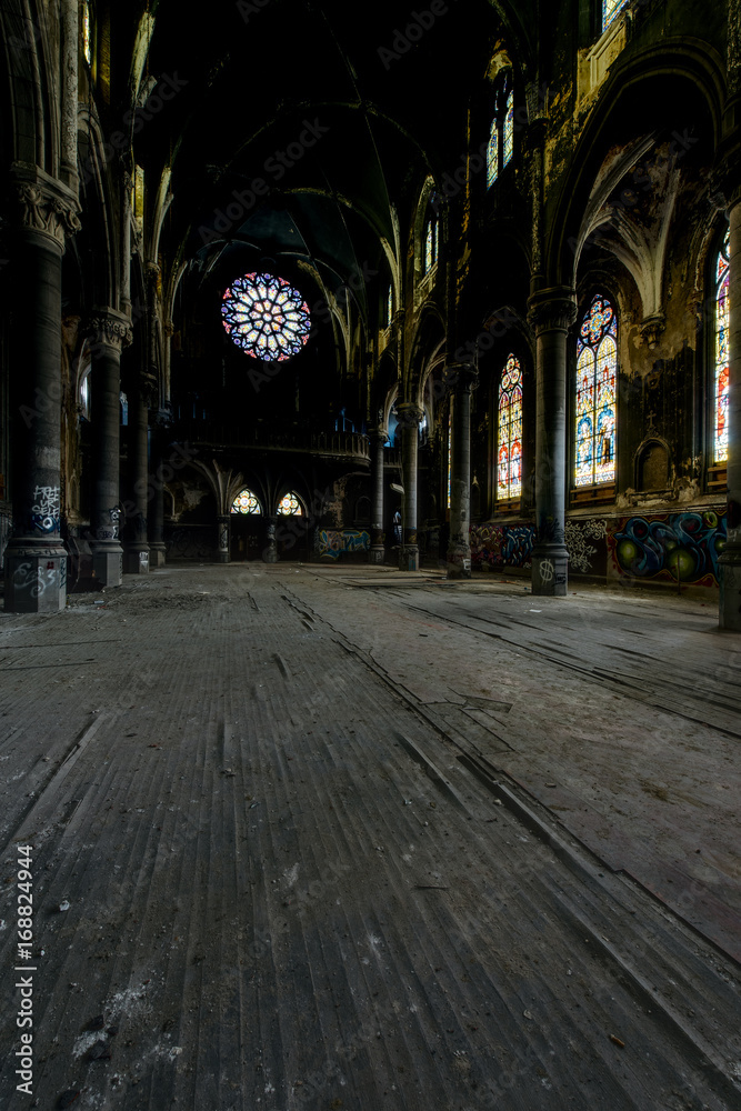 Dark Sanctuary with Stunning Stained Glass Windows and Wood Floor ...