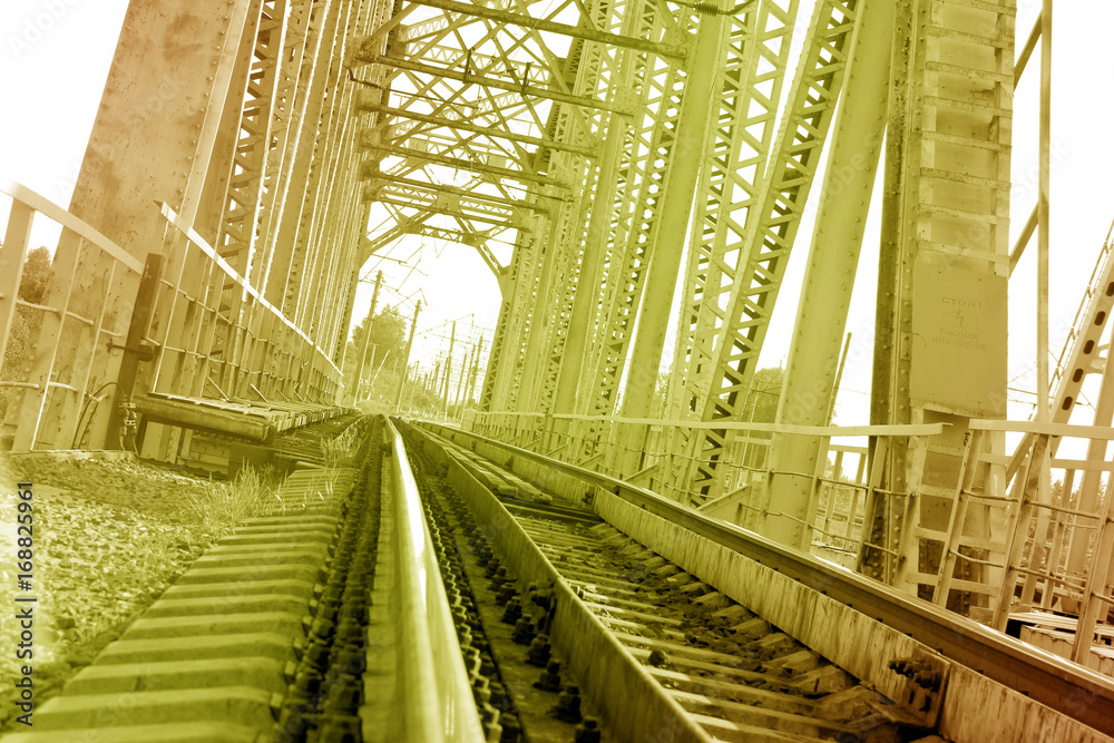 Railway metal bridge perspective view. Steel rail track Stock Photo ...