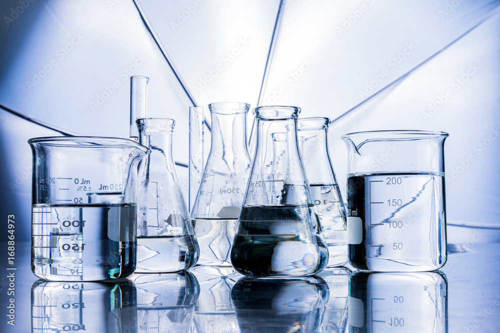 Glass beaker set with flask and science laboratory background Stock ...