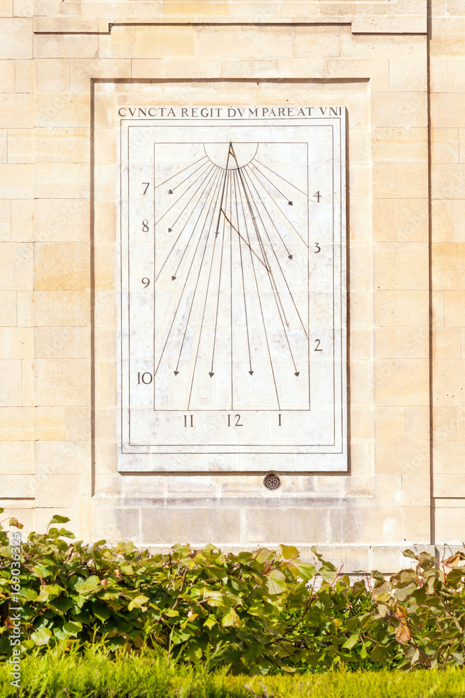 Antique sun clock on the wall of medieval castle, France foto de Stock ...