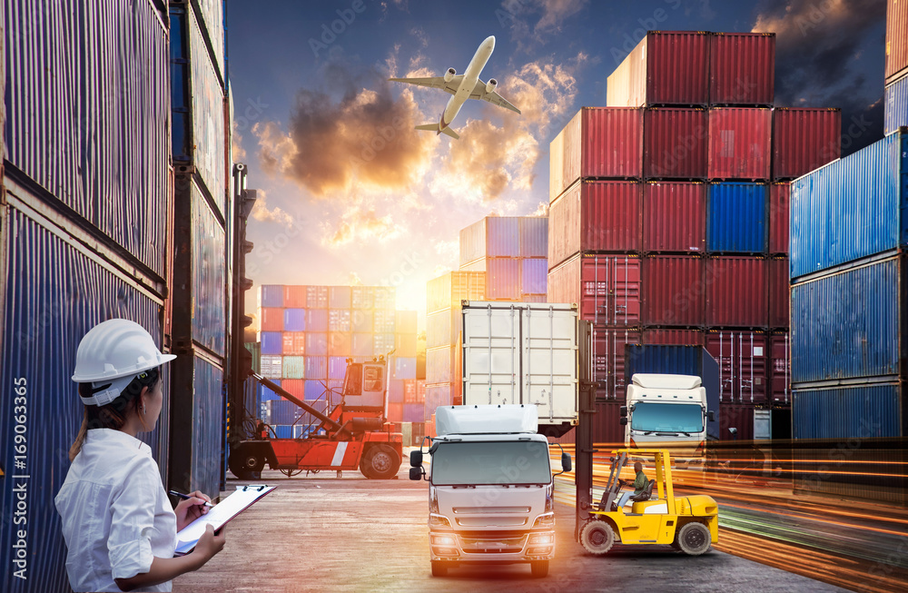 Female dock worker control, Forklift handling container box loading and ...