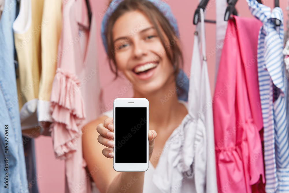 Modern white smart phone with blank screen for your advertisment or ...