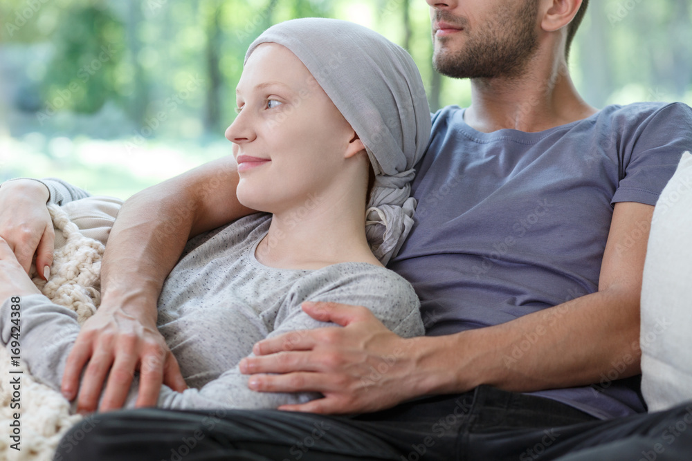 Husband hugging wife with cancer Stock Photo | Adobe Stock