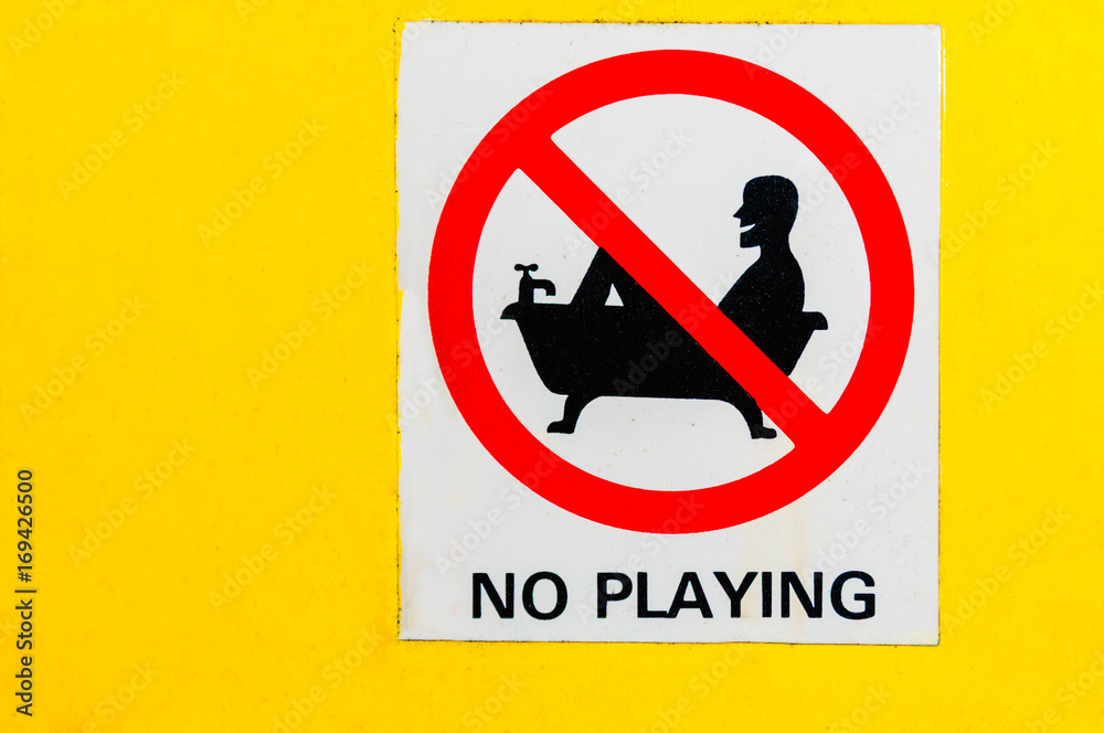 Sign on a bathroom door in a student house saying "No Playing ...