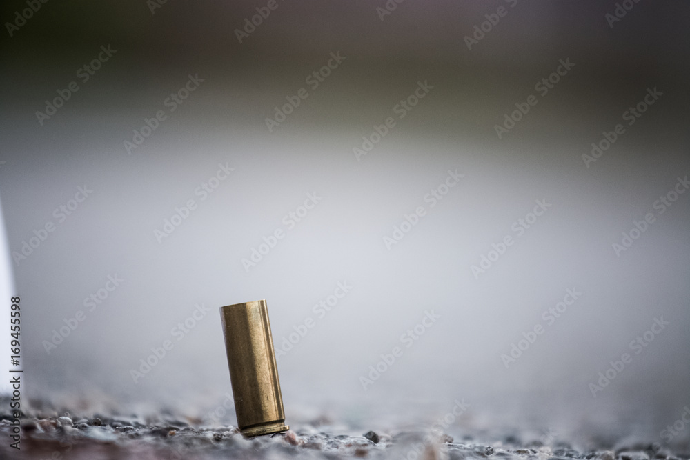 Bullet shell on the ground from the pistol. Crime scene investigation ...