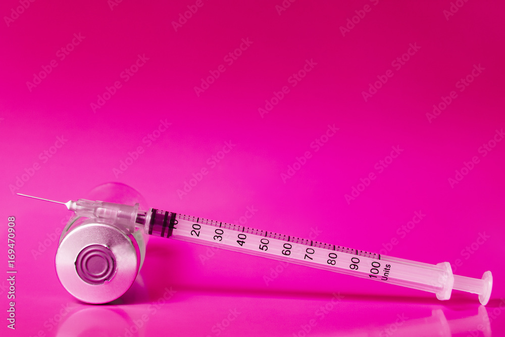 Syringe. Medical syringe on pink background with antibiotic injections ...