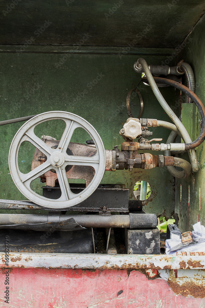 pump water driven by an electric motor and belt. Stock Photo | Adobe Stock