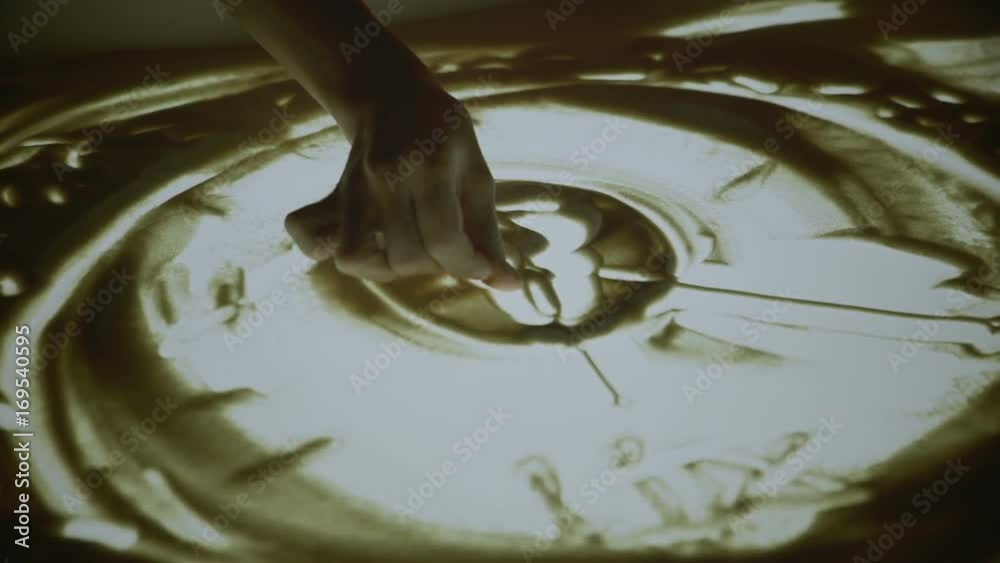 Drawing with sand. Short show. Drawing sand on a white screen. Sand ...