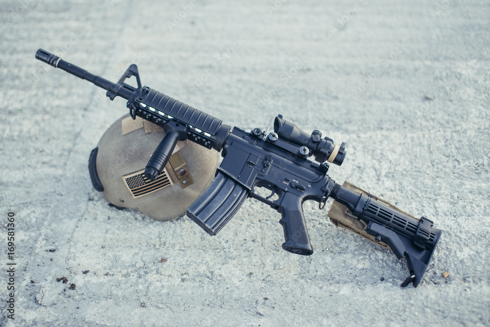American assault automatic rifle with spotting scope and helmet Stock ...