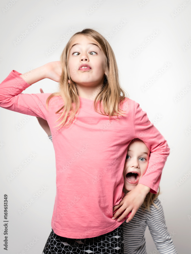 little kids pulling funny faces Stock Photo | Adobe Stock