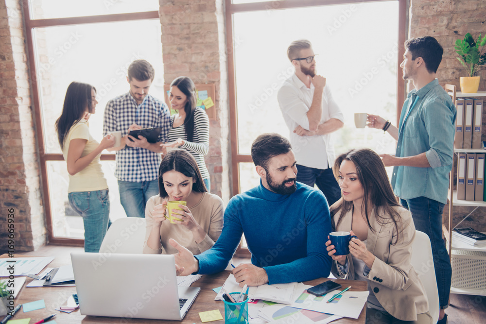 Great team work. Morning coffee break, relaxation in the office. Eight ...