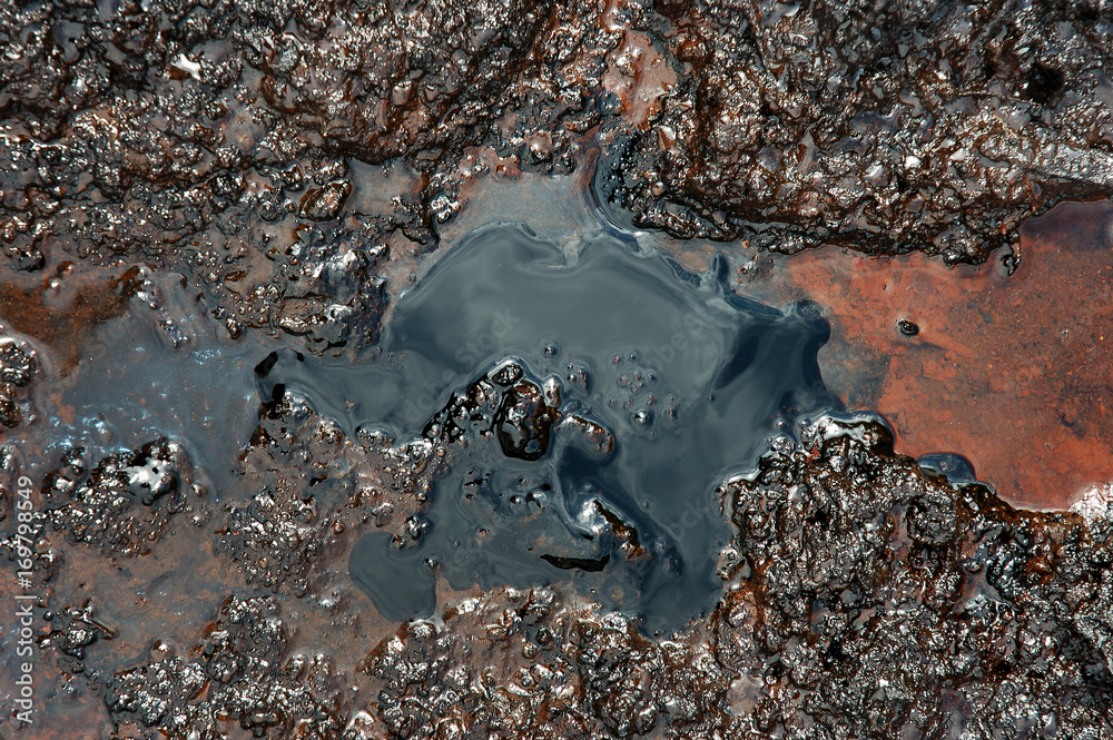 Spills of crude oil on the soil surface - environment pollution. Stock ...