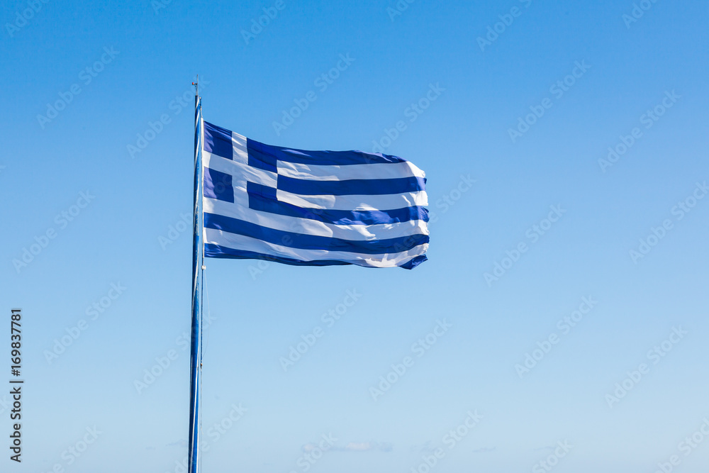 Greek biggest national flag waving in the sky in Keri in Zakynthos ...