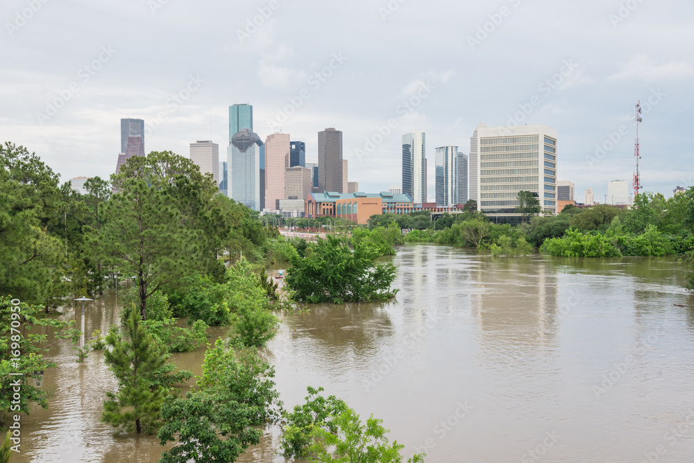 High and fast water rising in Bayou River along Allen Parkway and ...