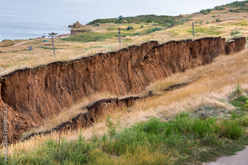 Soil landslide on slopes after earthquake. Stock Photo | Adobe Stock