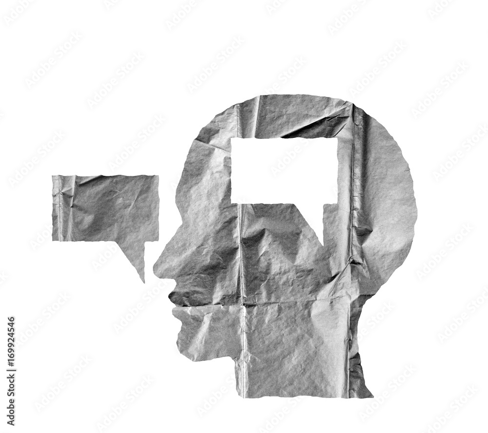 Crumpled paper shaped as a human head and talk balloon on white. Stock ...