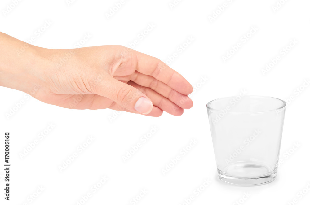 female hand holding transparent glass cup. Isolated on white background ...