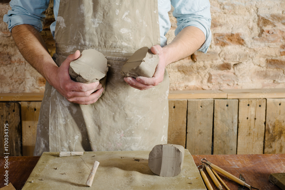 potter, workshop, ceramics art concept - standing young brunette man ...