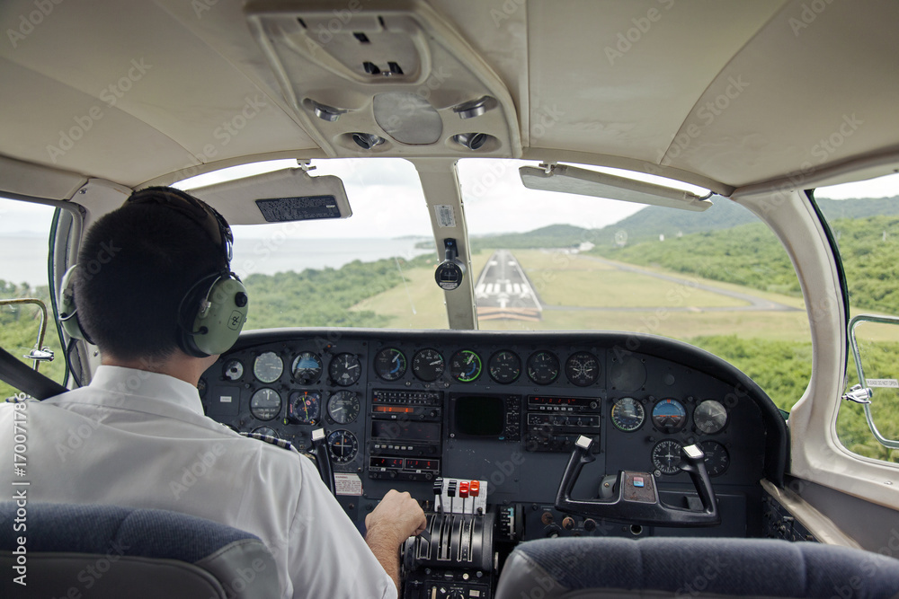 Interior shot of a plane cockpit landing Stock Photo | Adobe Stock