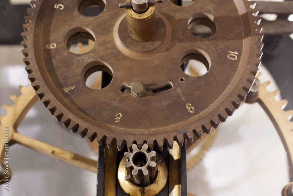 Old mechanism of a big tower clock. cogwheels in the clock Stock Photo ...