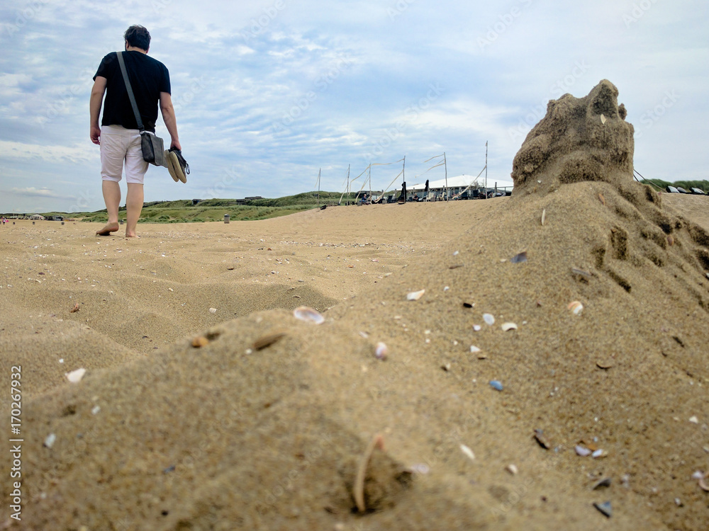 Strand mit Mann bei Den Haag Stock Photo | Adobe Stock