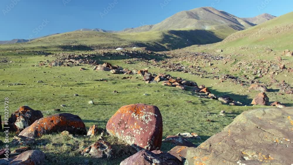 Mountain mongolian landscape with boulders covered by lichens on ...