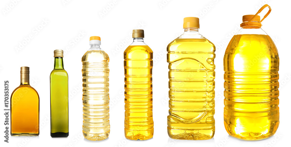 Different bottles with cooking oil on white background Stock Photo ...
