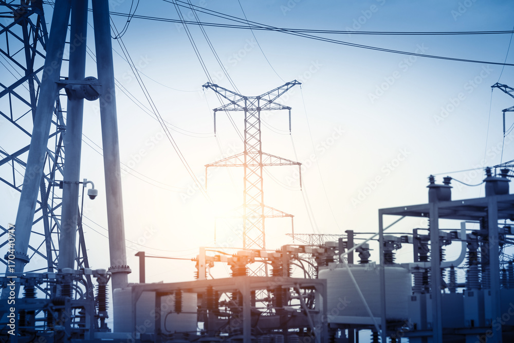 Electrical substation silhouette on the dramatic sunset background ...