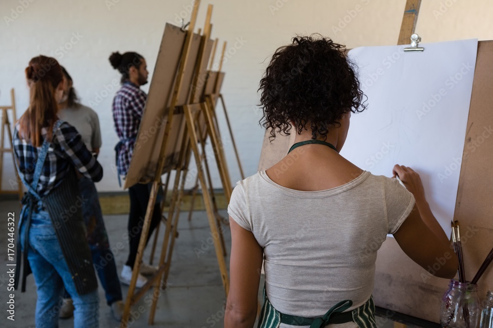 Painters painting in art class Stock Photo | Adobe Stock