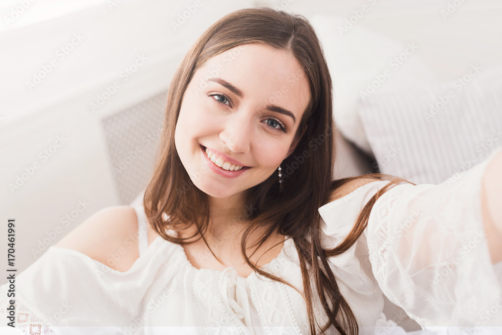 Cute smiling girl making selfie Stock Photo | Adobe Stock